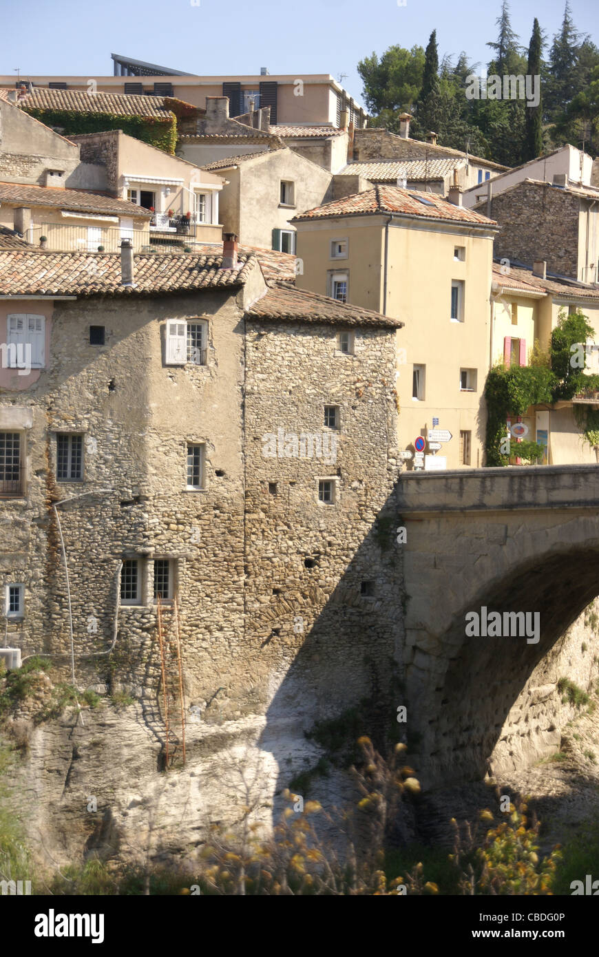 Roman bridge and medieval city, Vaison la Romaine, France Stock Photo ...