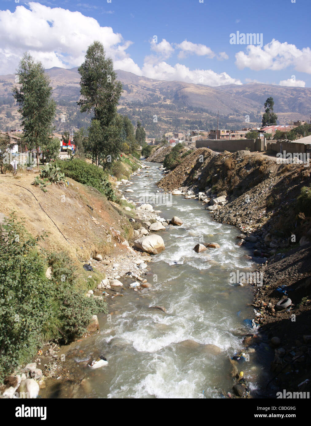 River in canyon amid houses in Huaraz, Peru Stock Photo - Alamy