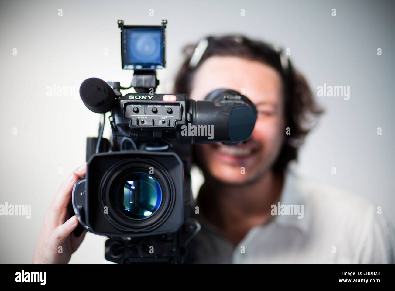 Cameraman with camera. TV, news, journalism, video, recoring, record ...