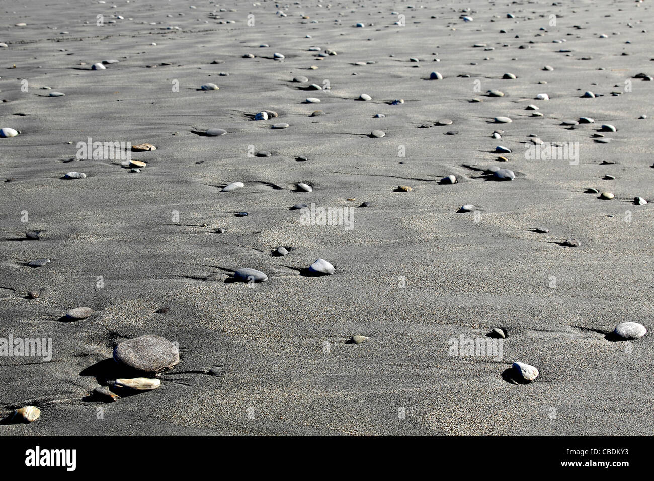 Rocks on a beach Stock Photo - Alamy