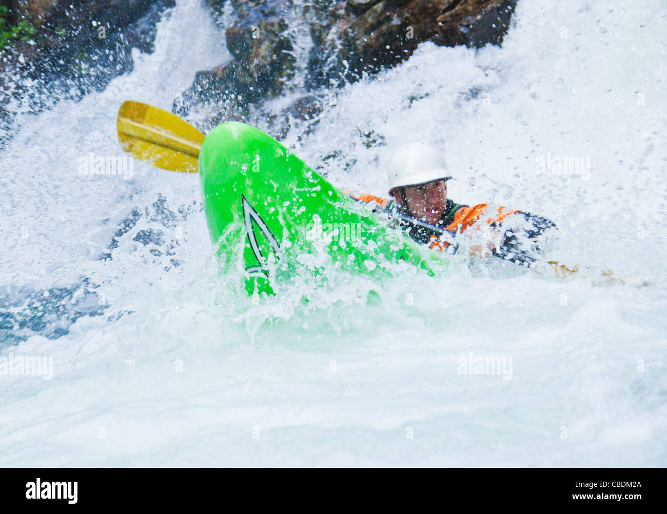 A man kayaking down a series of small waterfalls, Snoqualmie River ...
