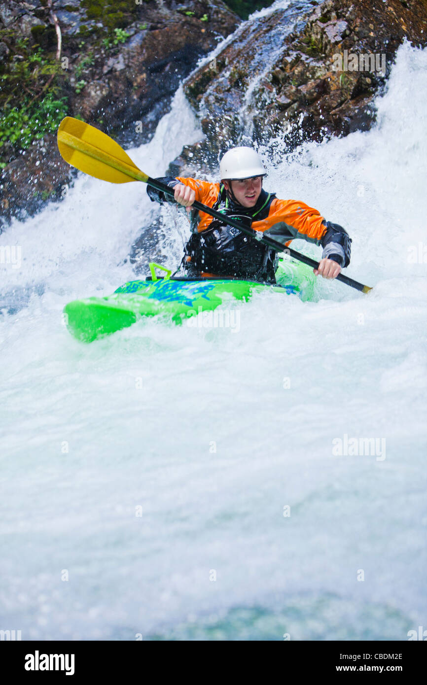 A man kayaking down a series of small waterfalls, Snoqualmie River ...