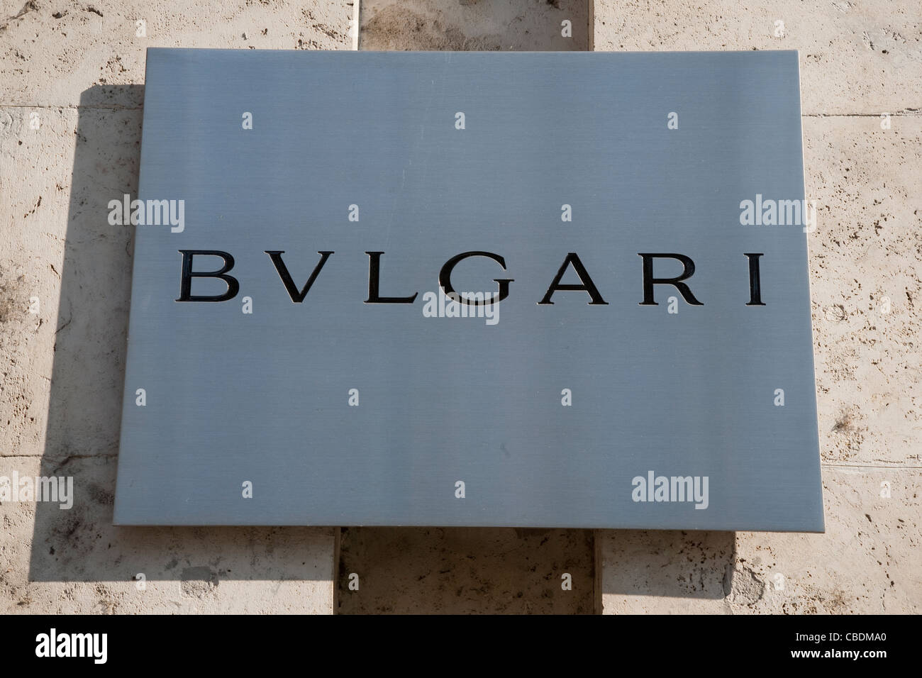 Silver Metal Bulgari Shopping Sign in Rome, Italy Stock Photo - Alamy