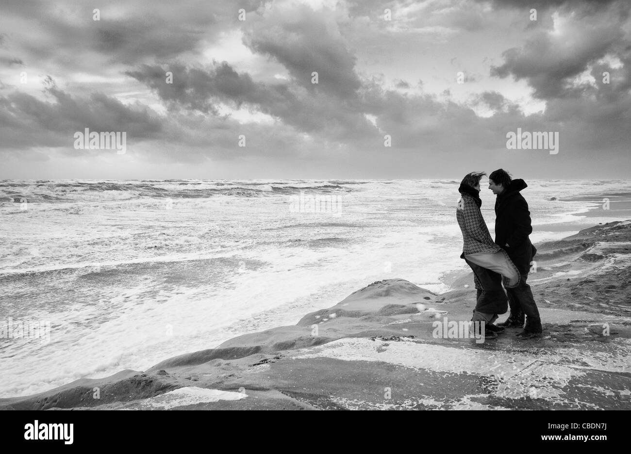 Beach people man woman Black and White Stock Photos & Images - Alamy