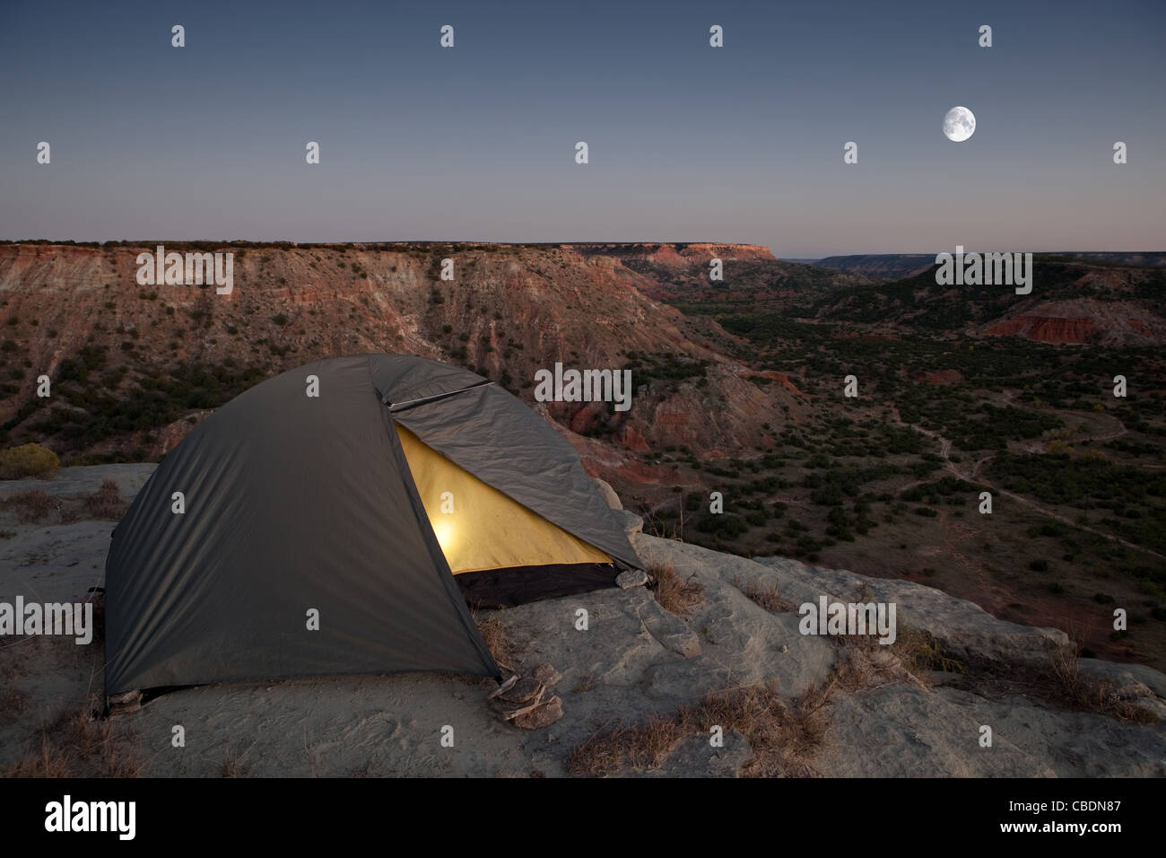 Camping at the Canyon, with light in tent Stock Photo - Alamy