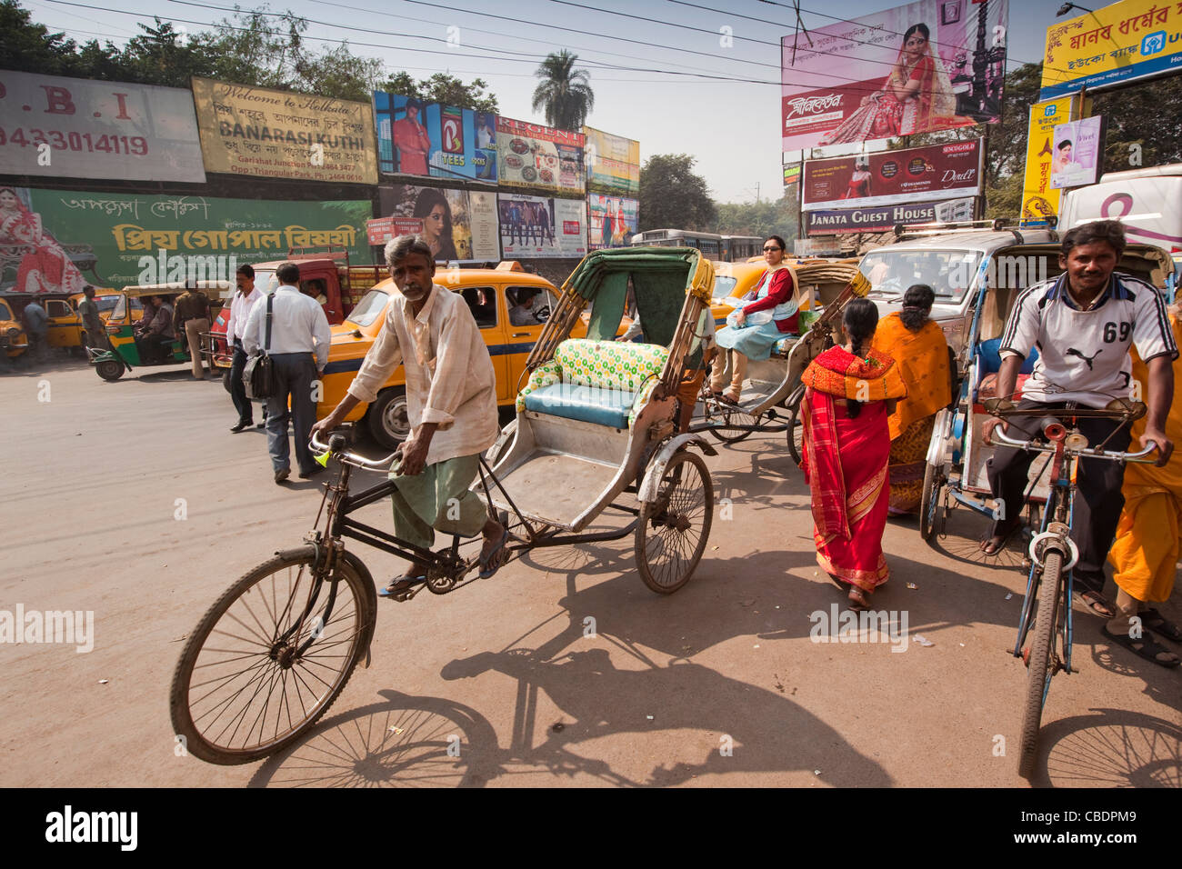 India, West Bengal, Kolkata, Dakshineswar cycle rickshaw amongst ...