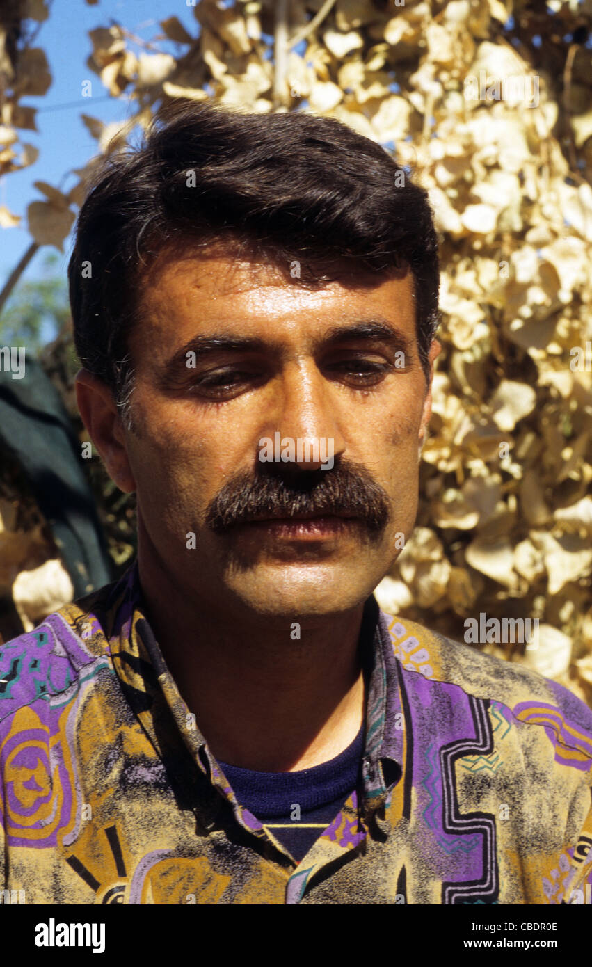 Kurdish refugee man driven out of his village by the Turkish army to ...
