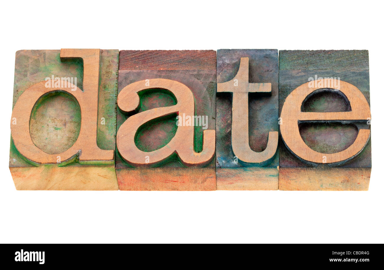 date - isolated word in vintage wood letterpress printing blocks Stock ...