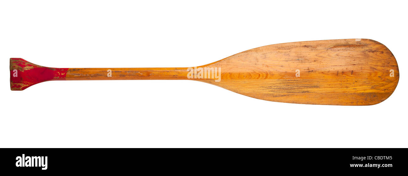 old wooden canoe paddle with a red grip, isolated on white with a ...