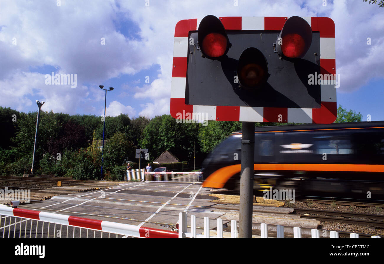 grand central train passing level crossing near Leeds Yorkshire UK ...