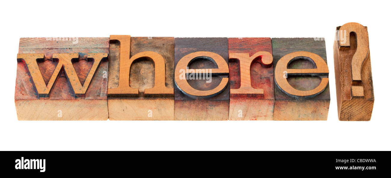 where question in vintage wood letterpress printing blocks, stained by ...