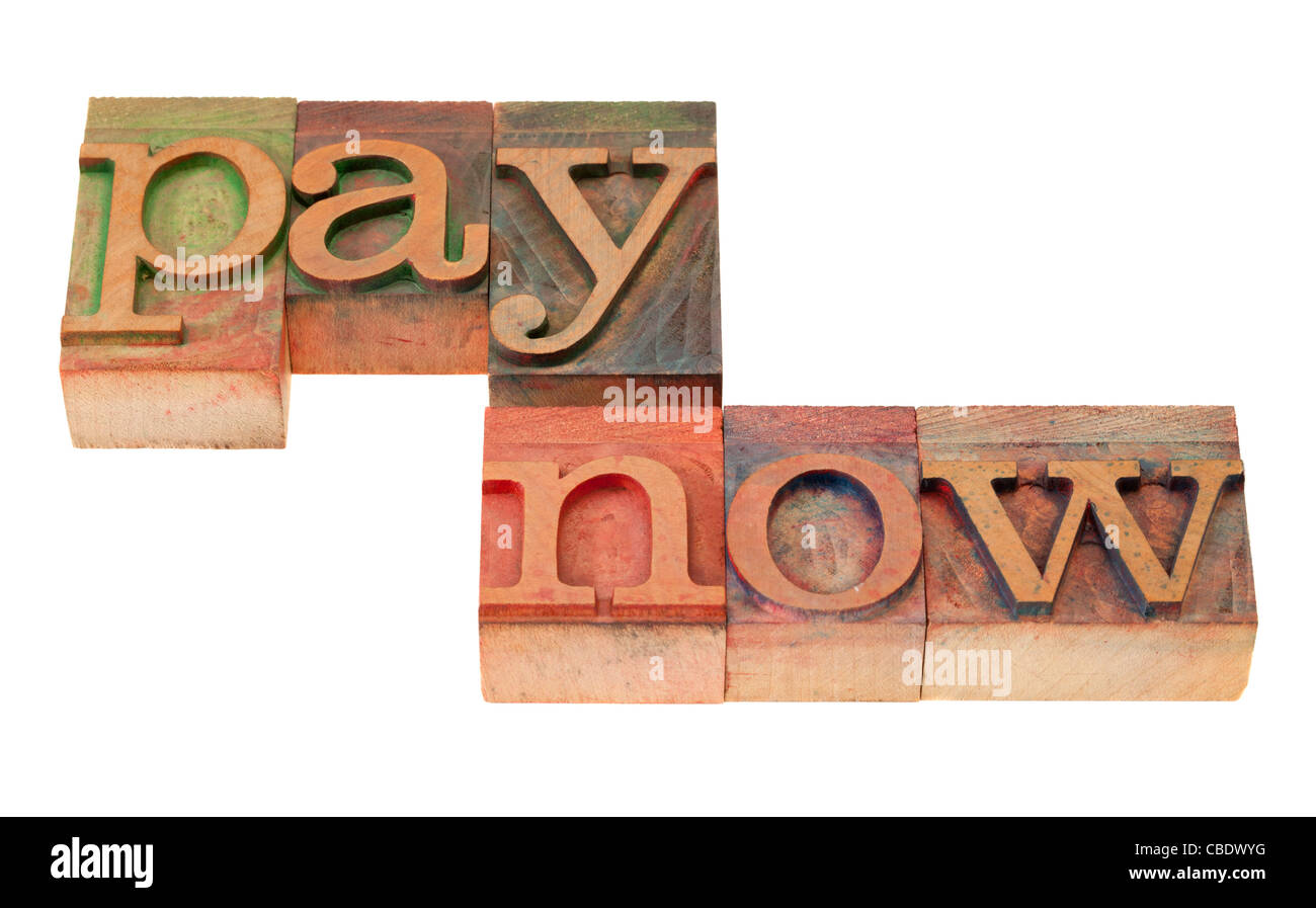 pay now - isolated words in vintage wood letterpress printing blocks ...