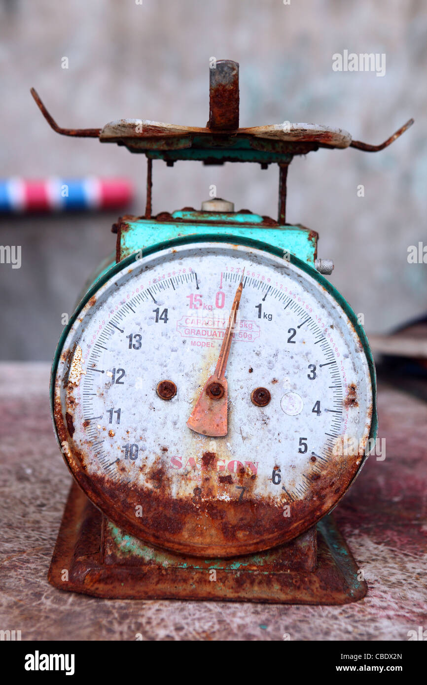 Rusty weighing scales at Kota Kinabalu waterfront market Stock Photo ...