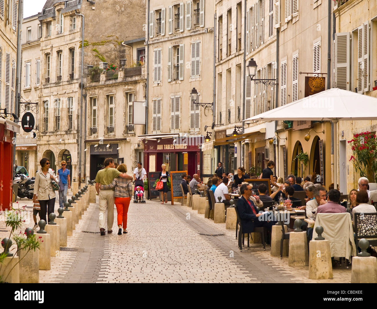 People walking and eating in restaurants in a pedestrian street of La ...