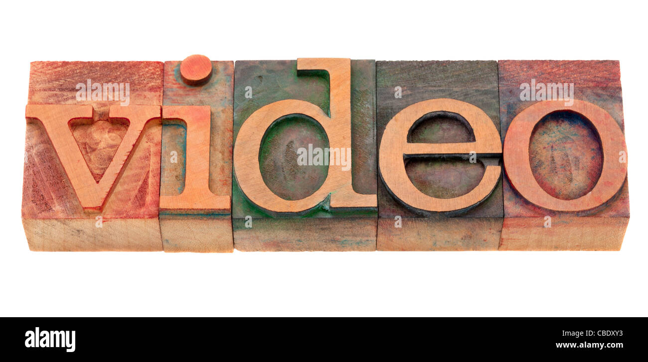 video word in vintage wooden letterpress printing blocks, stained by ...