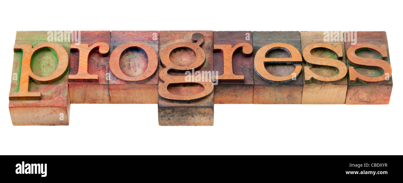 progress - word in vintage wooden letterpress printing blocks, stained ...
