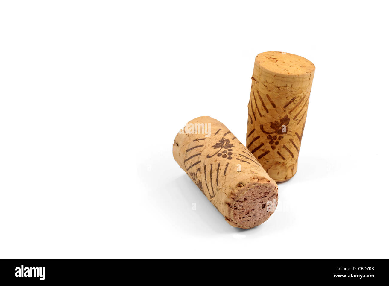 Two isolated corks with white background Stock Photo - Alamy