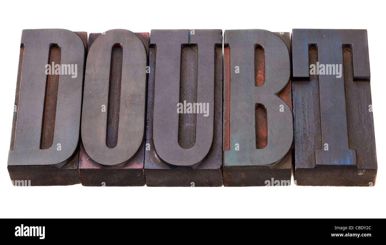 doubt - word in vintage wooden letterpress printing blocks, stained by ...