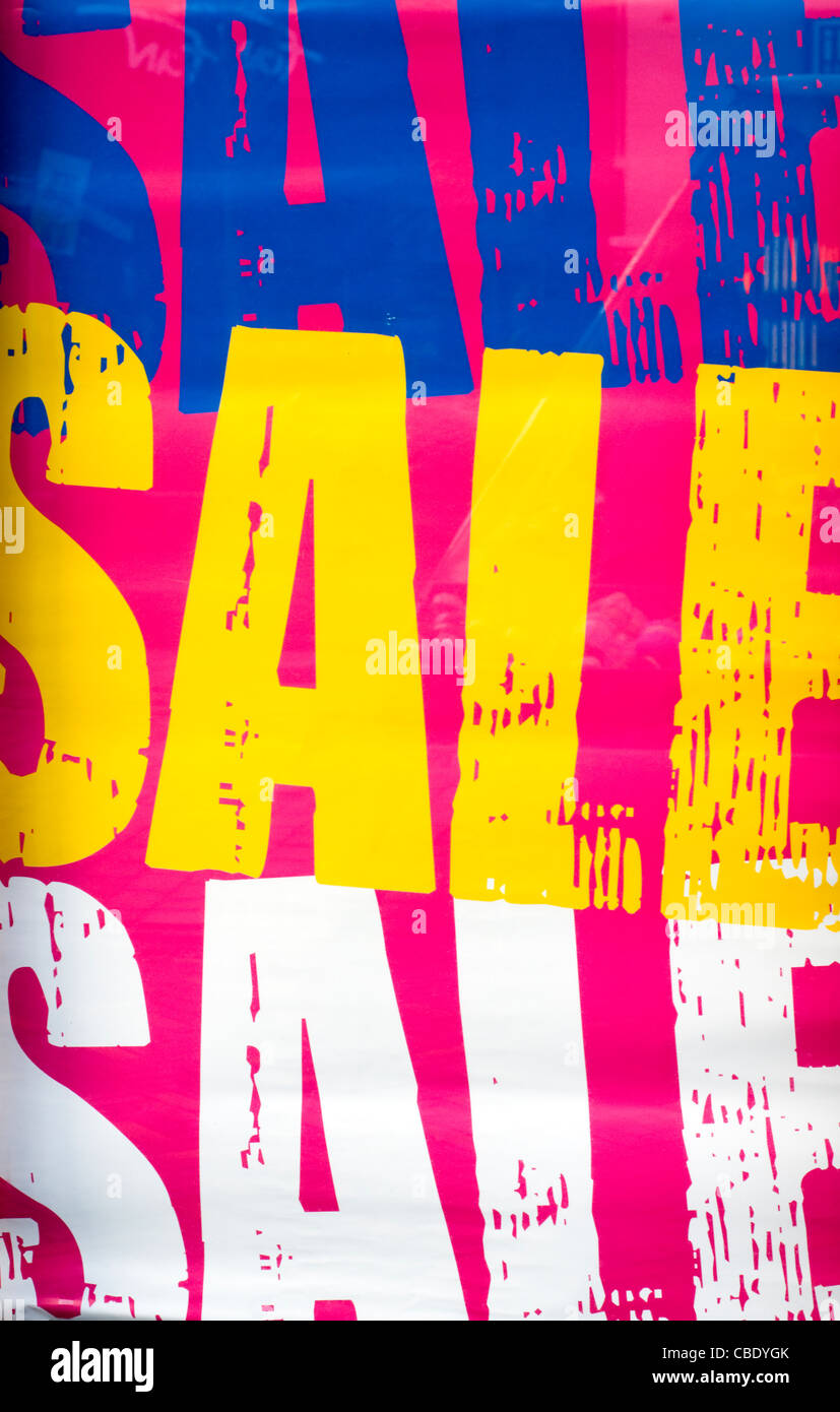 Sale signs in a high street shop window Stock Photo - Alamy