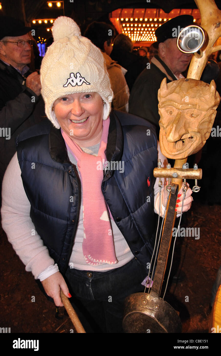 Tourist playing traditional German instrument at Christmas Market ...