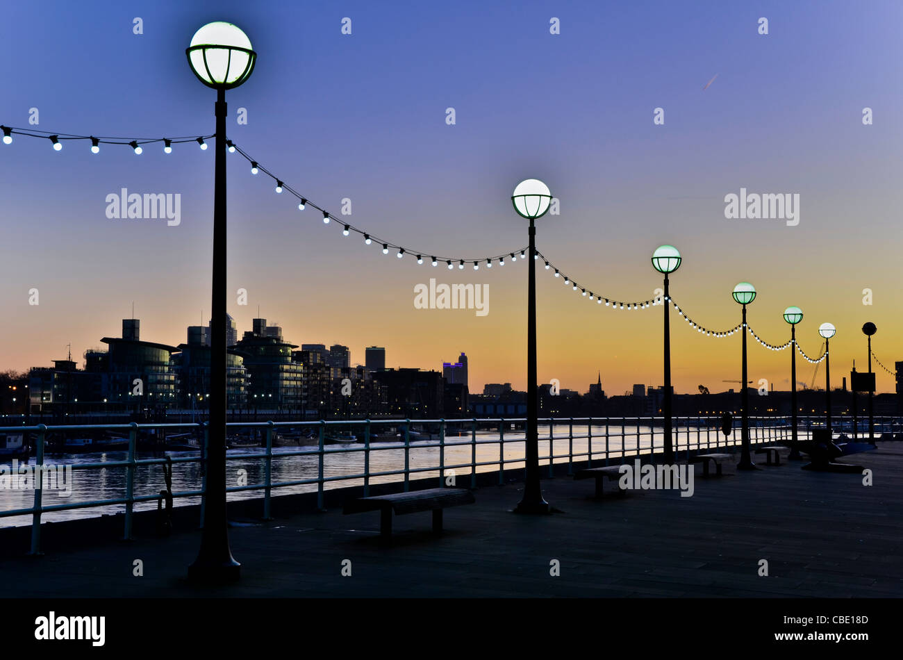 Thames River promenade at night Stock Photo - Alamy