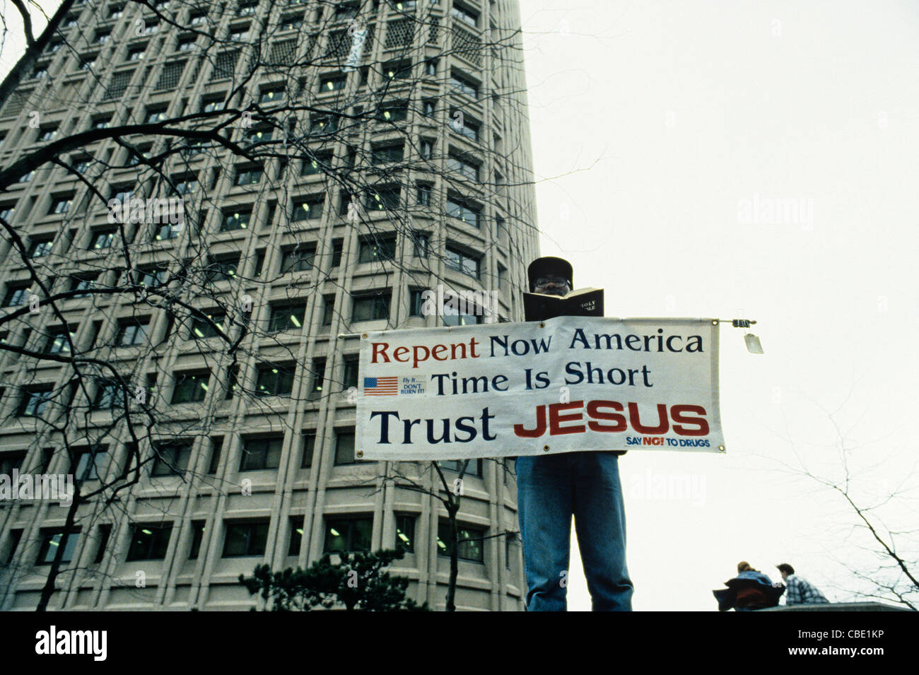 War protest at the Federal Building in downtown Seattle with a preacher ...