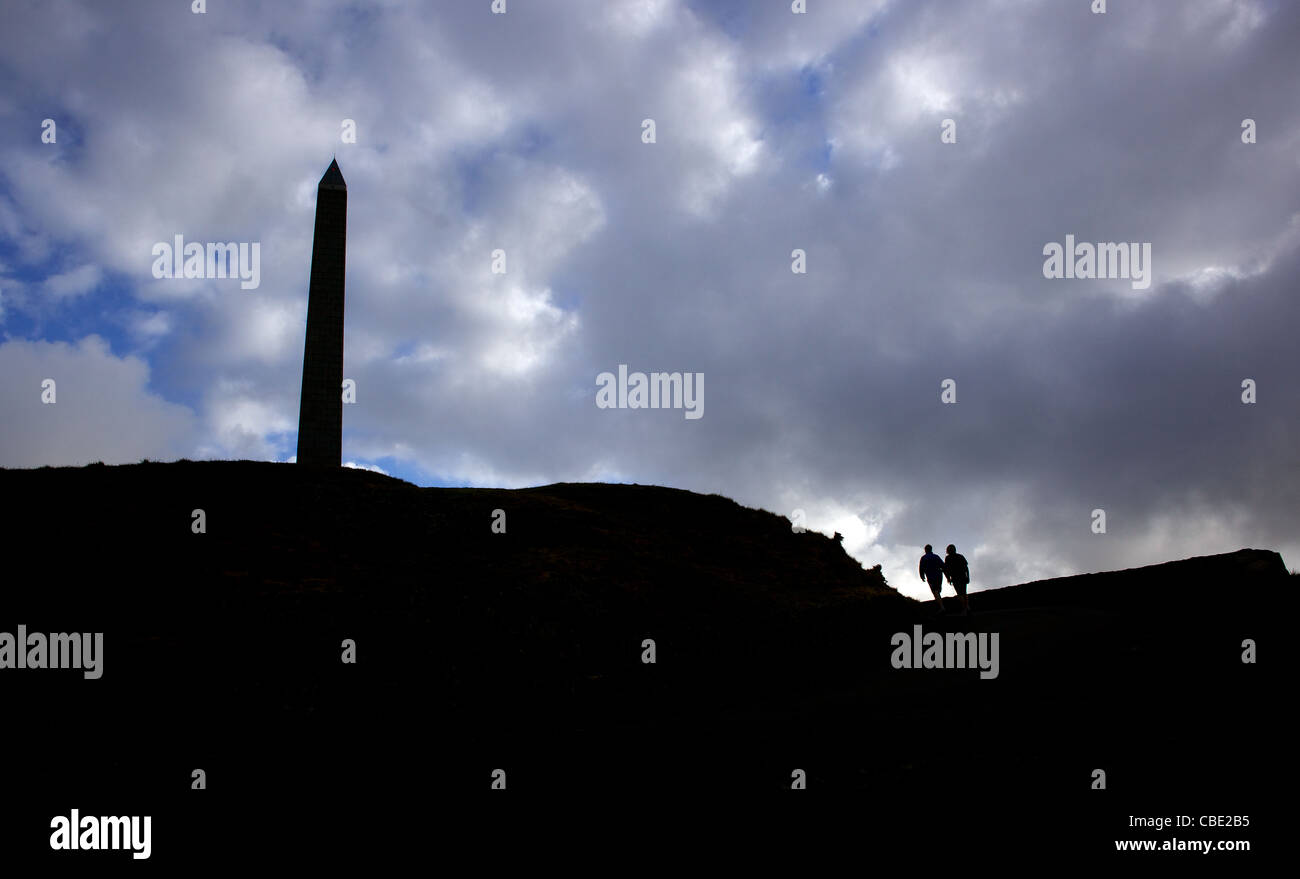 Walkers at One Tree Hill, an historic landmark in Auckland, New Zealand ...