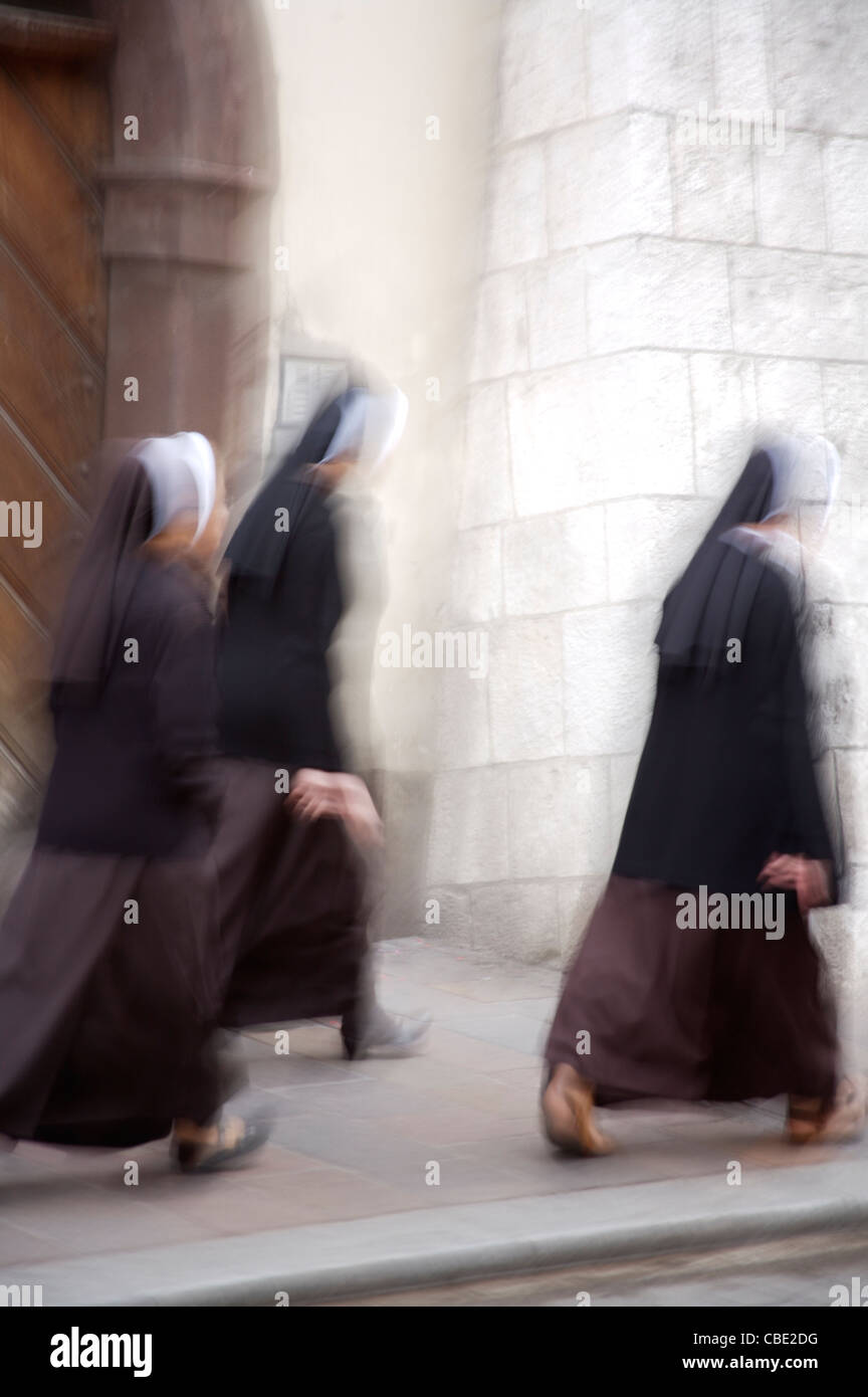 Three nuns walking hi-res stock photography and images - Alamy
