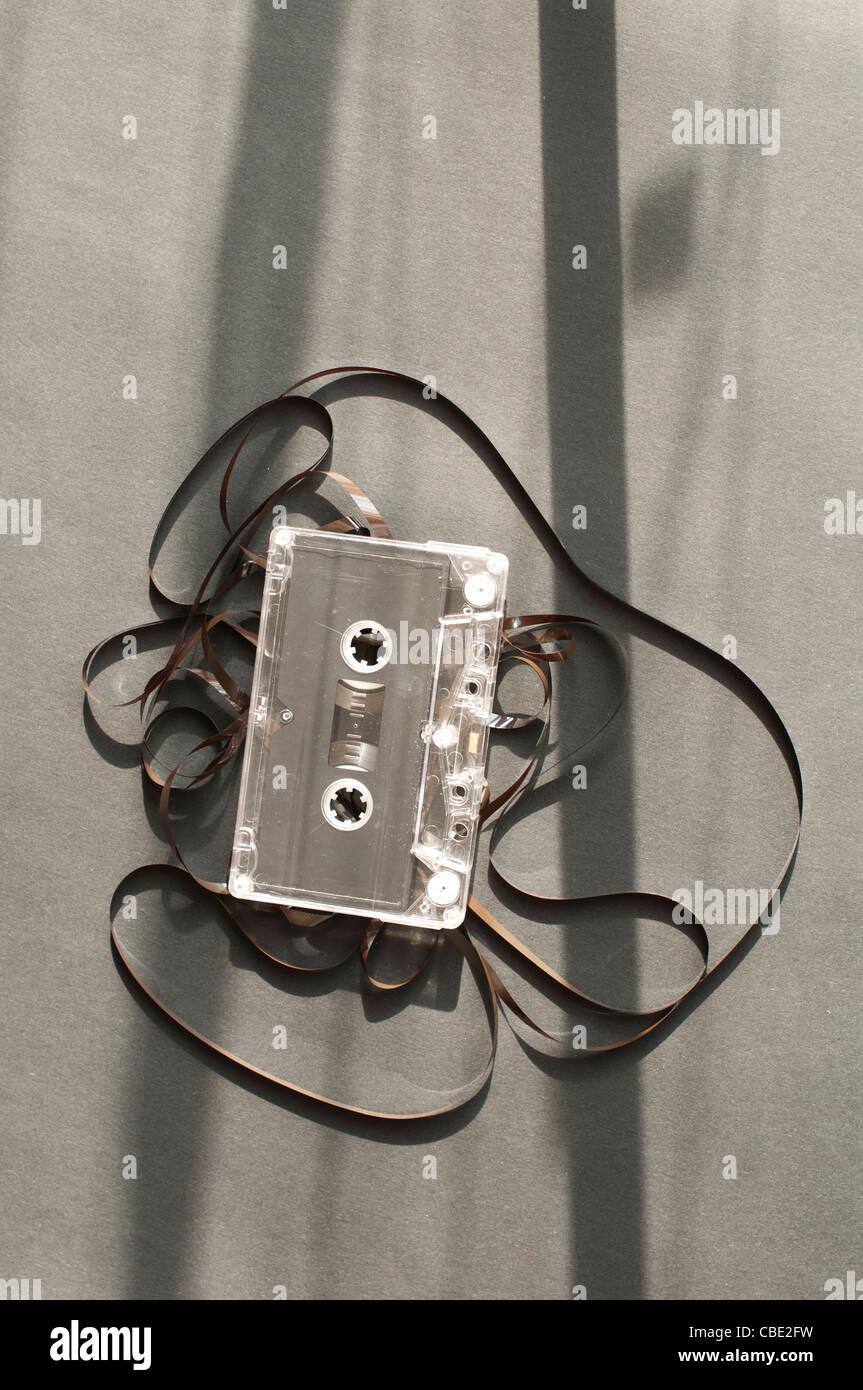 Audio tape cassette with subtracted out tape. Old broken cassette Stock ...