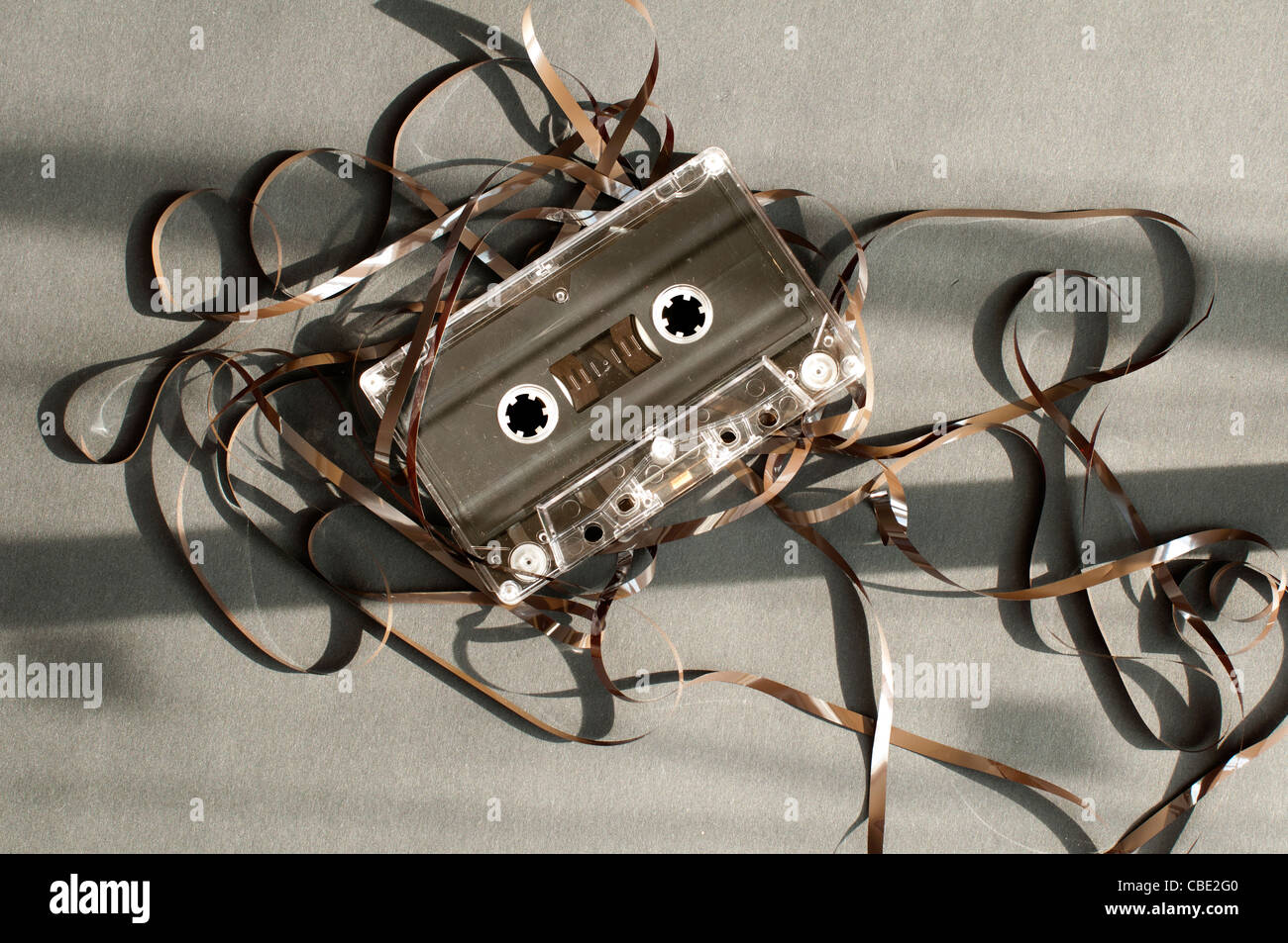 Audio tape cassette with subtracted out tape. Old broken cassette Stock ...
