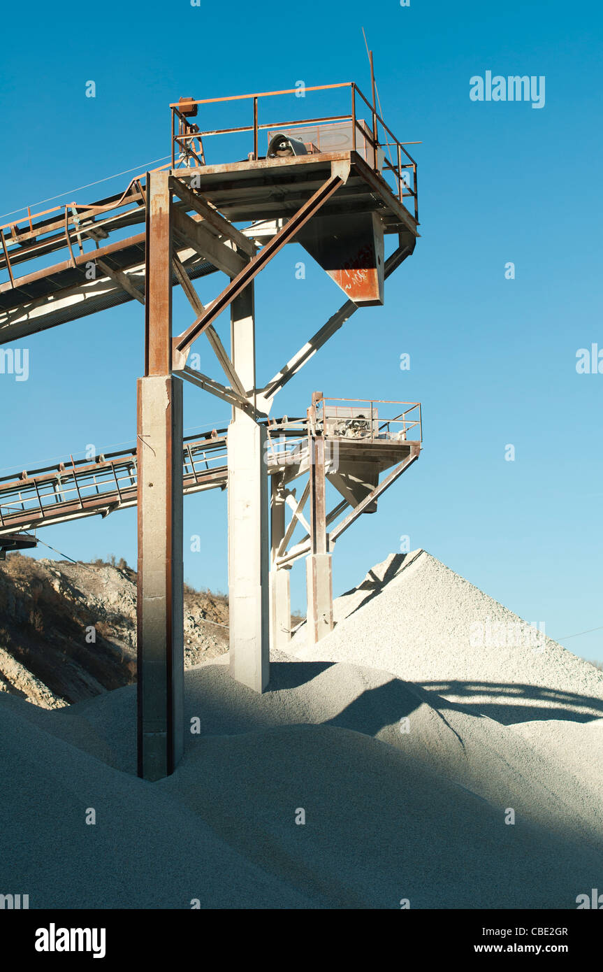 Machinery in a limestone quarry.Piles of limestone rocks Stock Photo ...