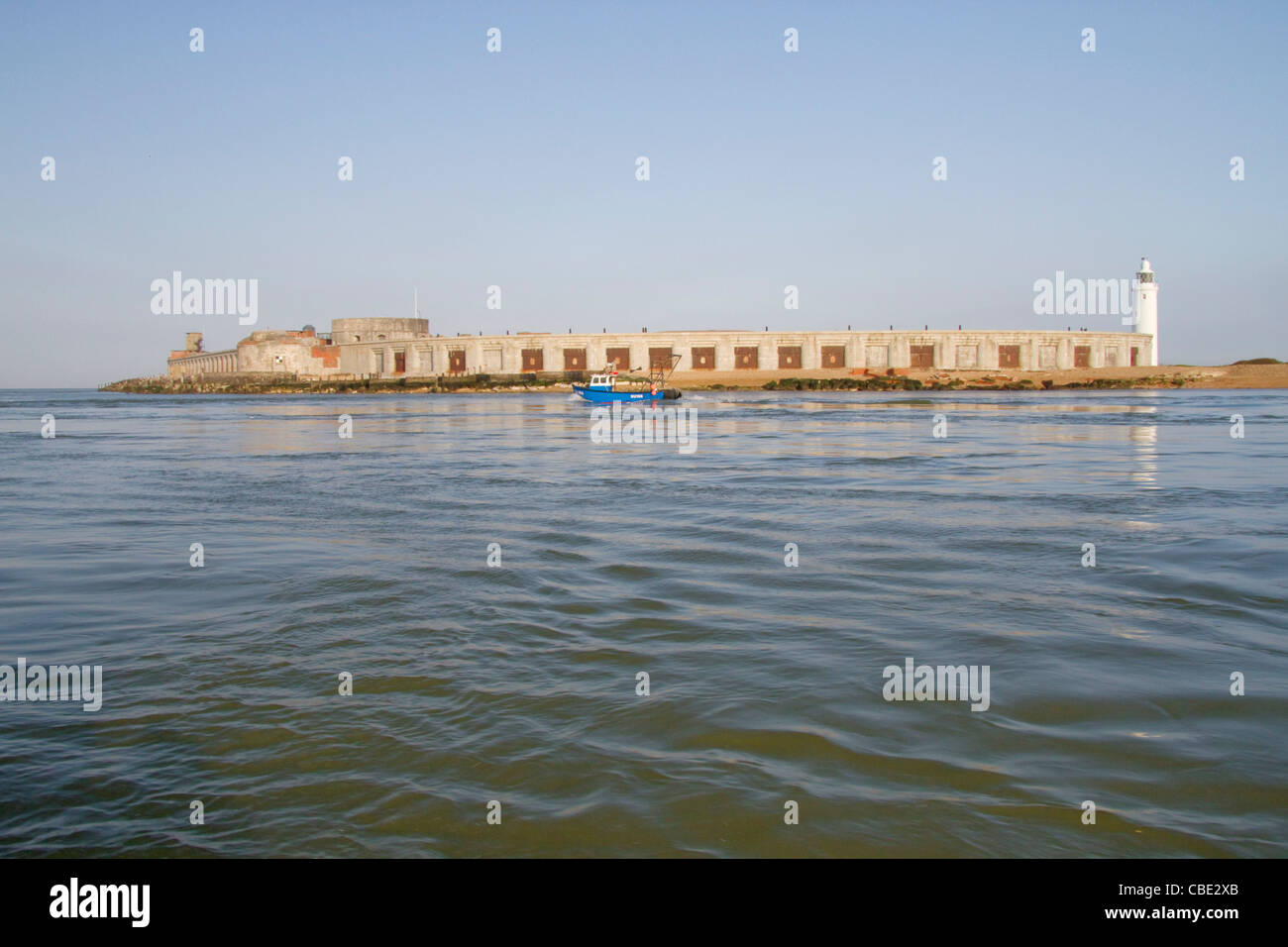 Hurst Castle and lighthouse, Hurst Point on the Hampshire coast, viewed ...
