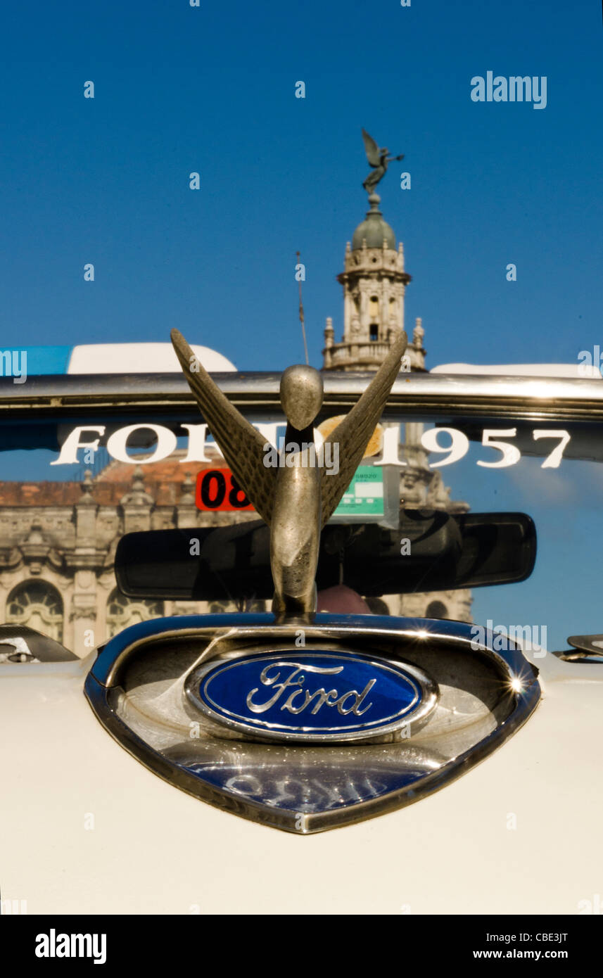 Detail of old American Ford car parked with Cuba National Theatre in ...