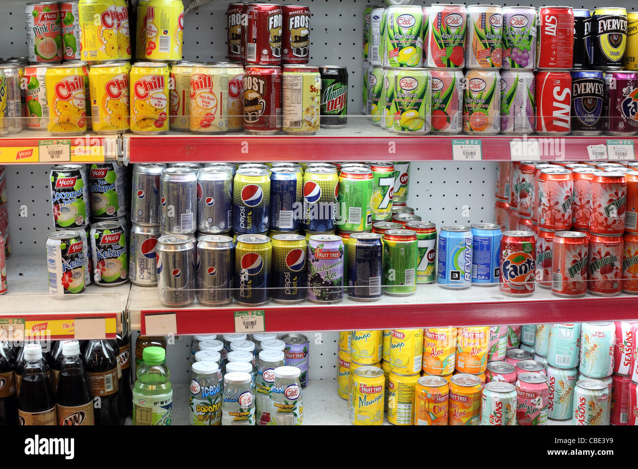 Refrigerated can drinks in supermarket Stock Photo - Alamy