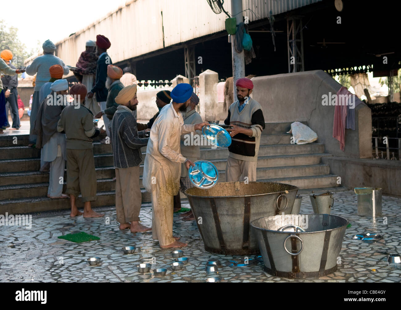 Kitchen dish washing sikh sikhism hi-res stock photography and images ...