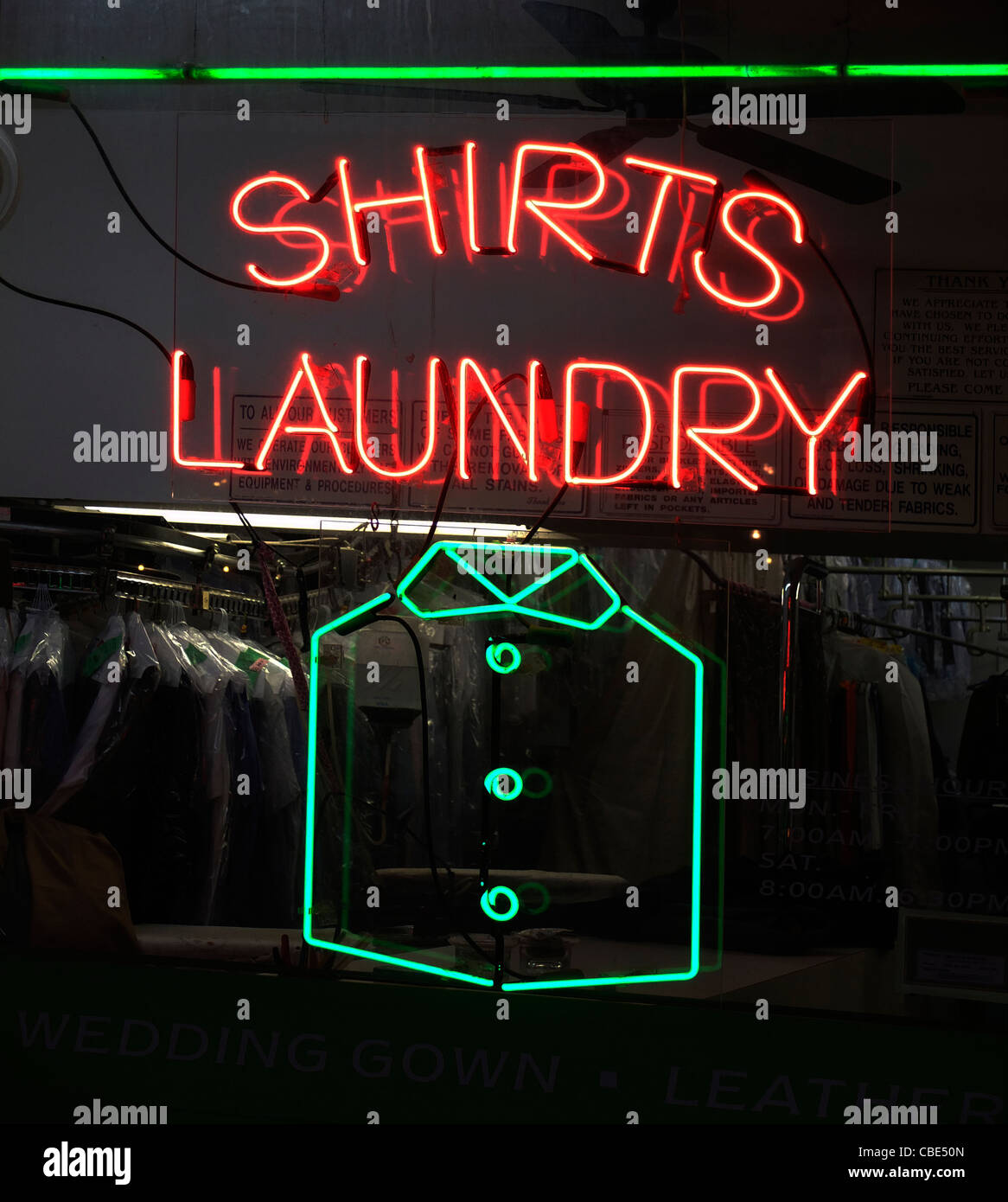 neon shirts laundry sign Stock Photo - Alamy