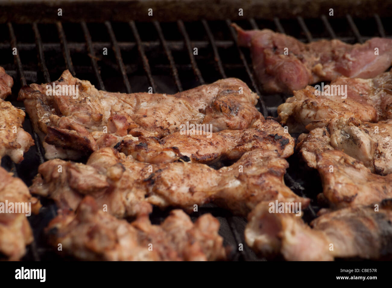 Close shot of hot fresh meat on grill Stock Photo - Alamy