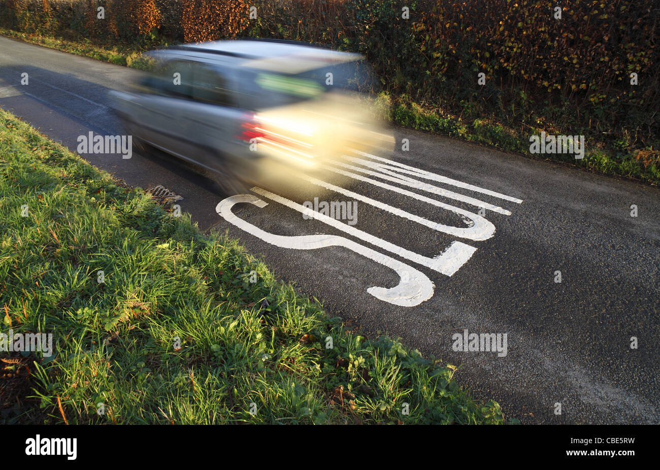 The Word Slow Painted On A Country Road Stock Photo Alamy the-word-slow-painted-on-a-country-road-stock-photo-alamy