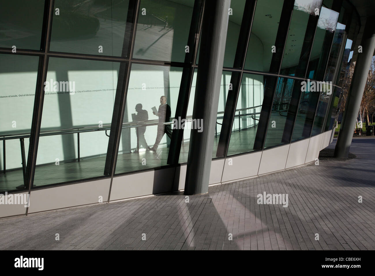 People walk inside the City Hall GLA building in London, England, UK ...
