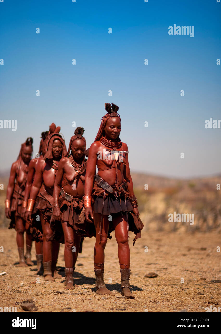 Group Of Muhimba Women Walking, Village Of Elola, Angola Stock Photo ...