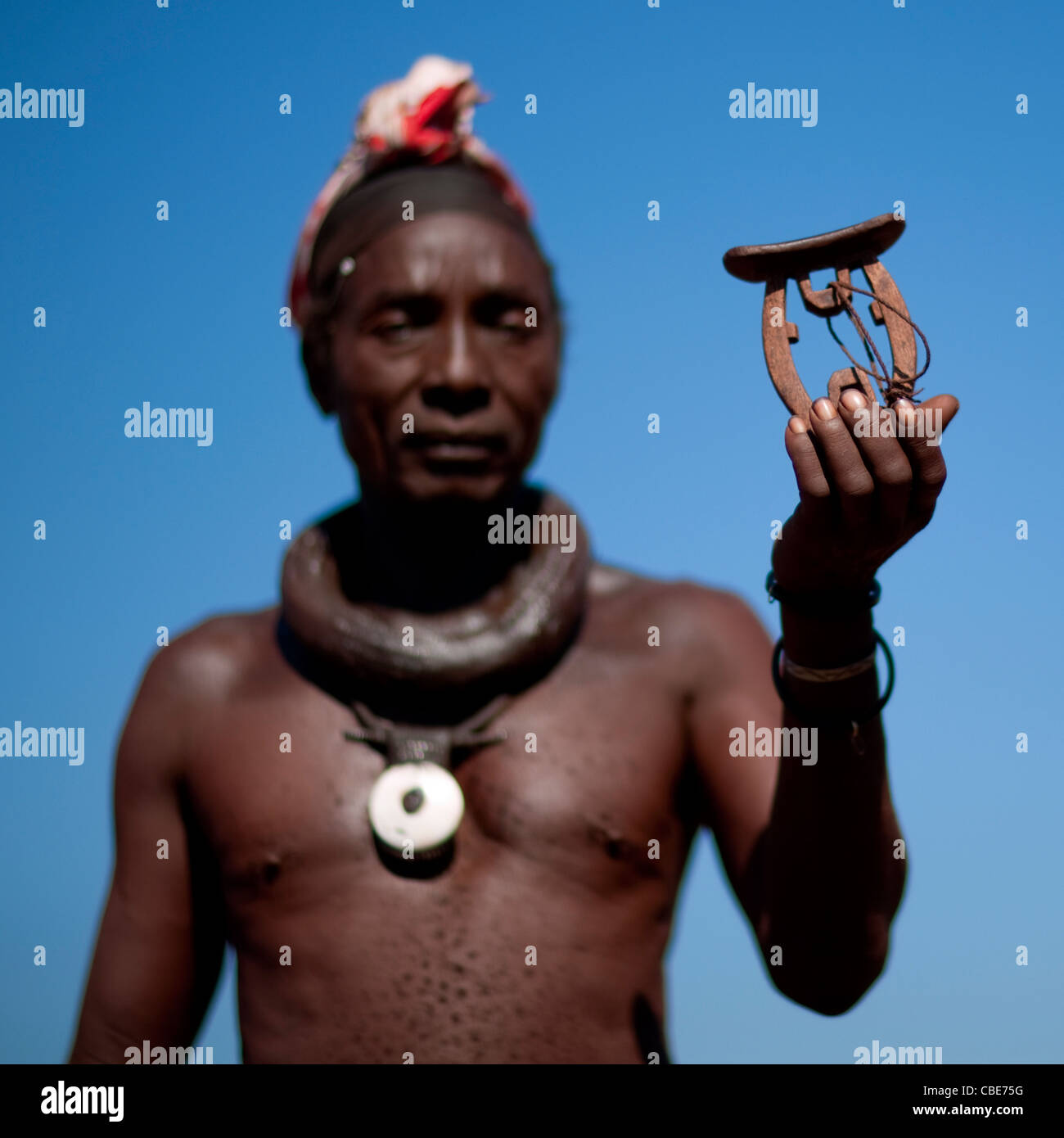 Old Muhimba Man Showing His Headrest, Village Of Elola, Angola Stock ...