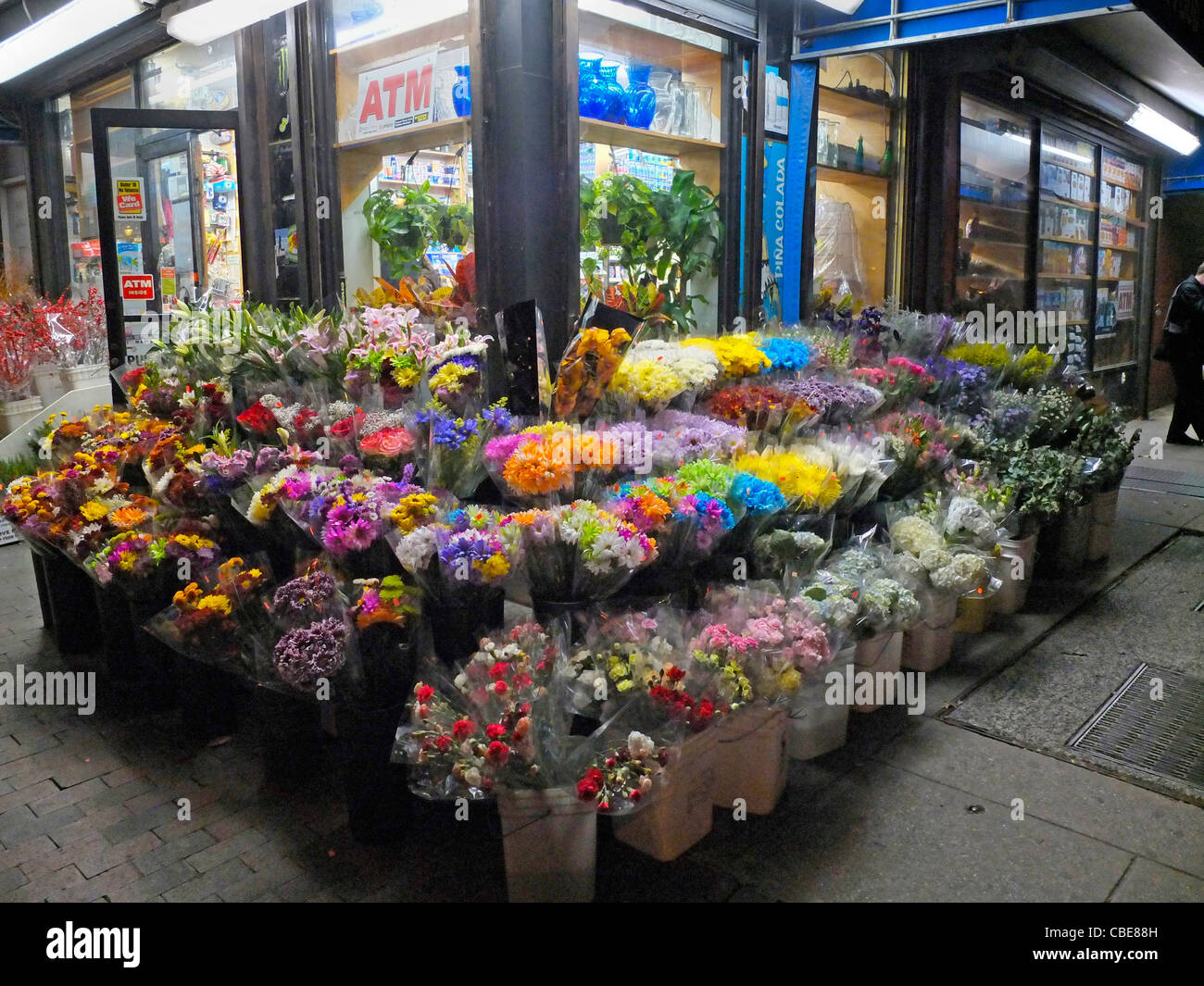 flowers for sale at a corner bodega store in Brooklyn NYC Stock Photo ...
