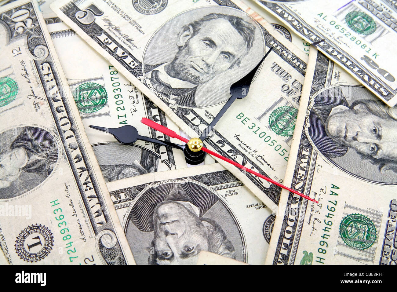 clock and dollars, concept of time is money Stock Photo - Alamy
