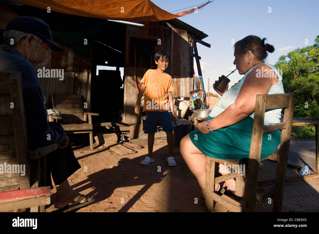 Paraguayan family at home in the shanty town of La Chacarita, Asuncion ...