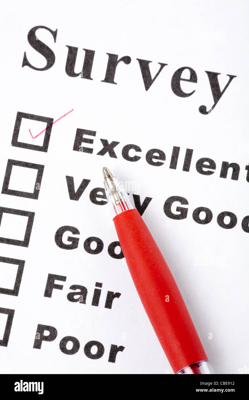 questionnaire and pen, business concept Stock Photo - Alamy