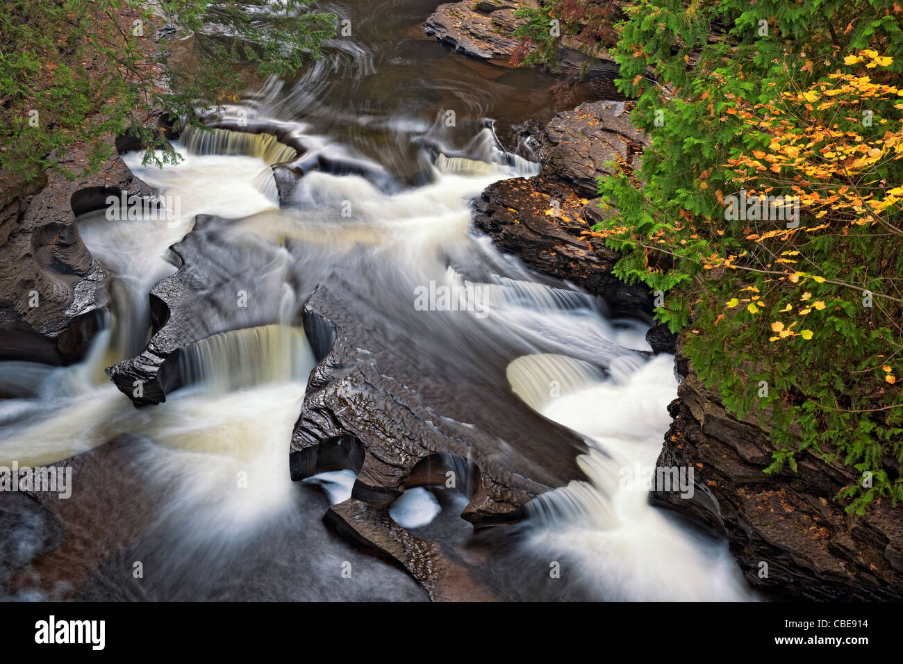 The Wild and Scenic Presque Isle River creates these Potholes among the ...