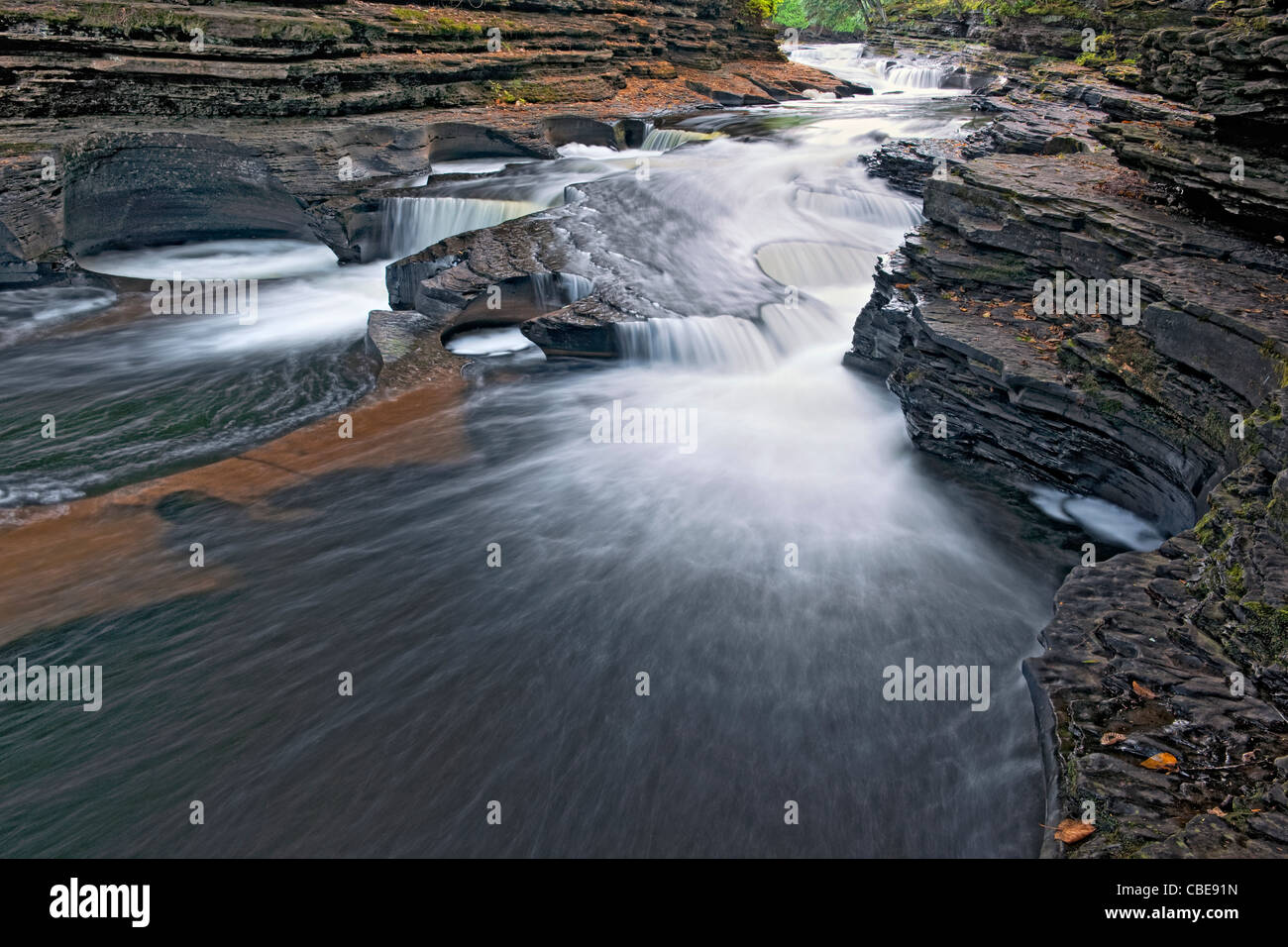 The Wild and Scenic Presque Isle River creates these Potholes among the ...