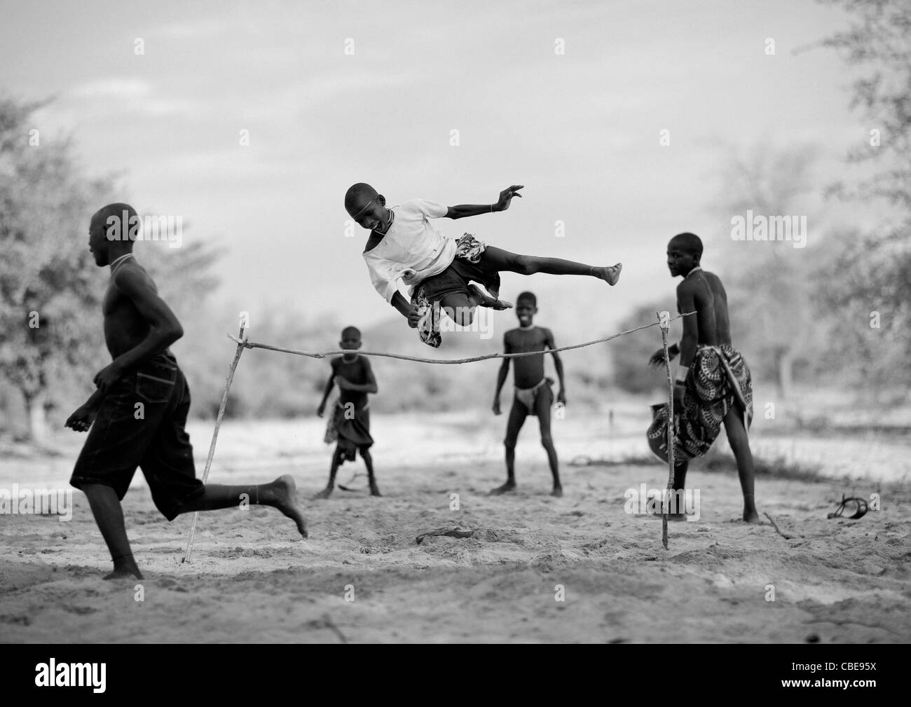 Mukubal Kids Doing High Jumping, Virie Area, Angola Stock Photo - Alamy