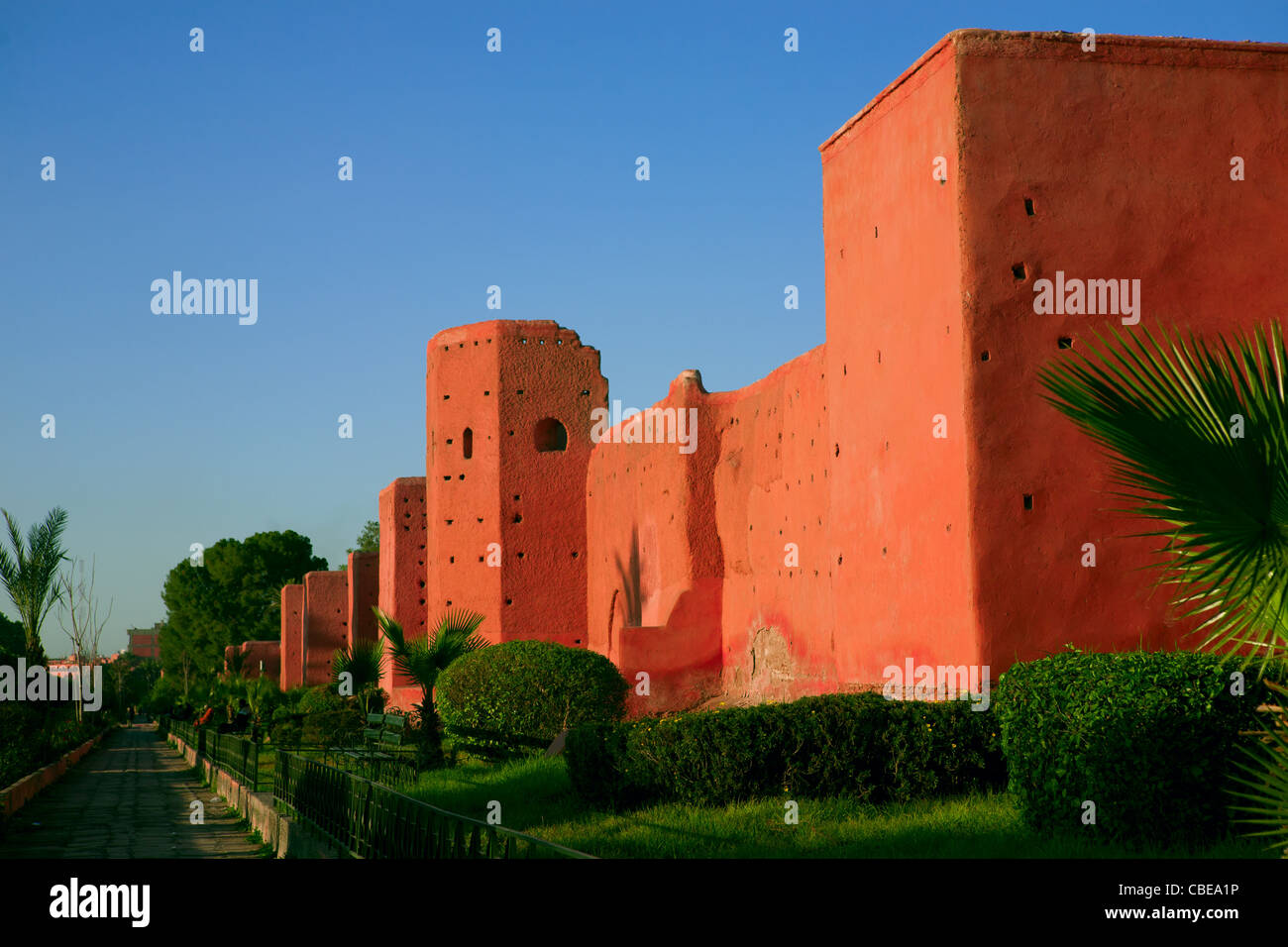 Old city wall in Marrakech on sunset Stock Photo - Alamy