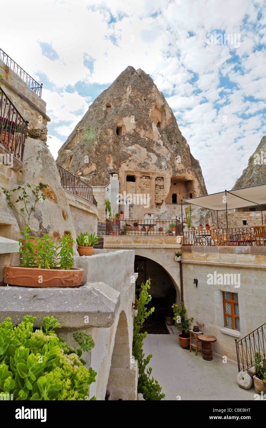 Portrait limestone cave converted to bespoke villa with veranda ...